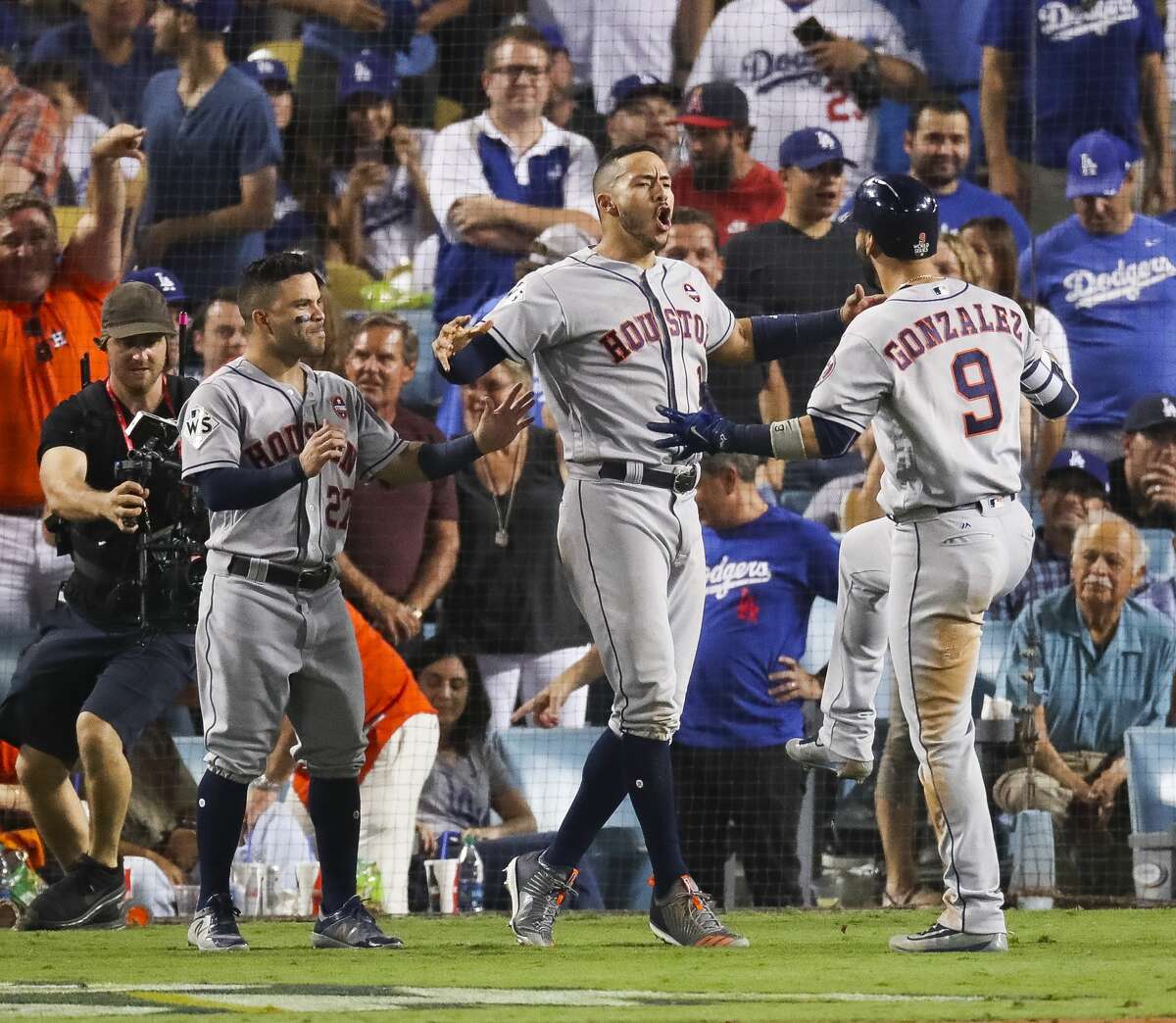 Marwin Gonzalez points to 'Houston Strong' patch after tying HR