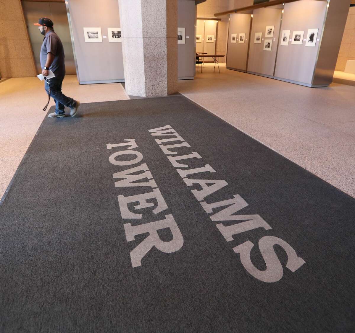 What is at the top of the imposing Williams Tower?