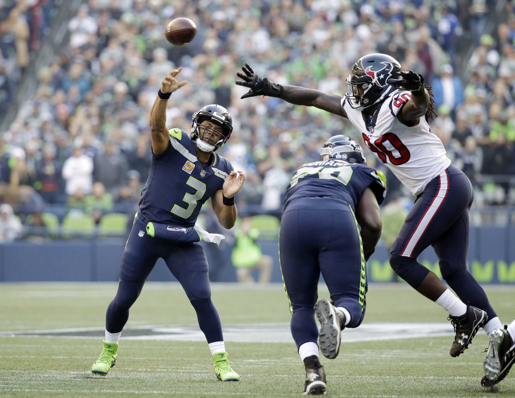 NFL: Wilson's heroics lead Seahawks to wild win over Texans