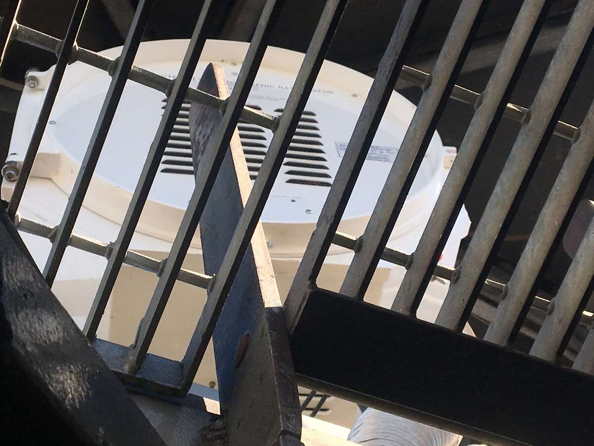 What is at the top of the imposing Williams Tower?