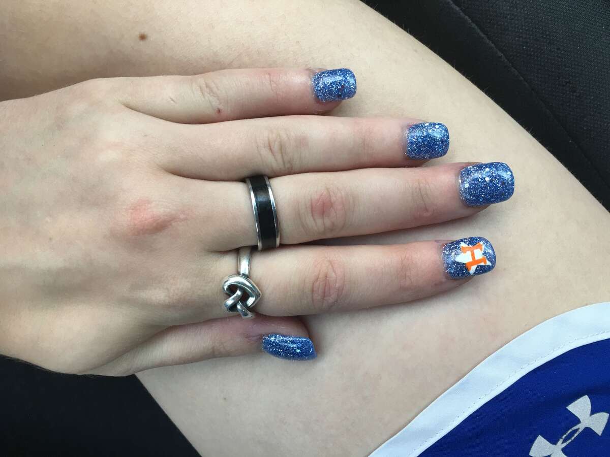 Houston Astros fans and nail artists are painting the town orange and blue
