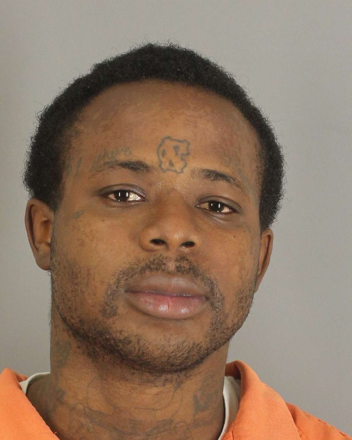Man with dollar sign tattoo over his eye wanted for burglary, domestic ...
