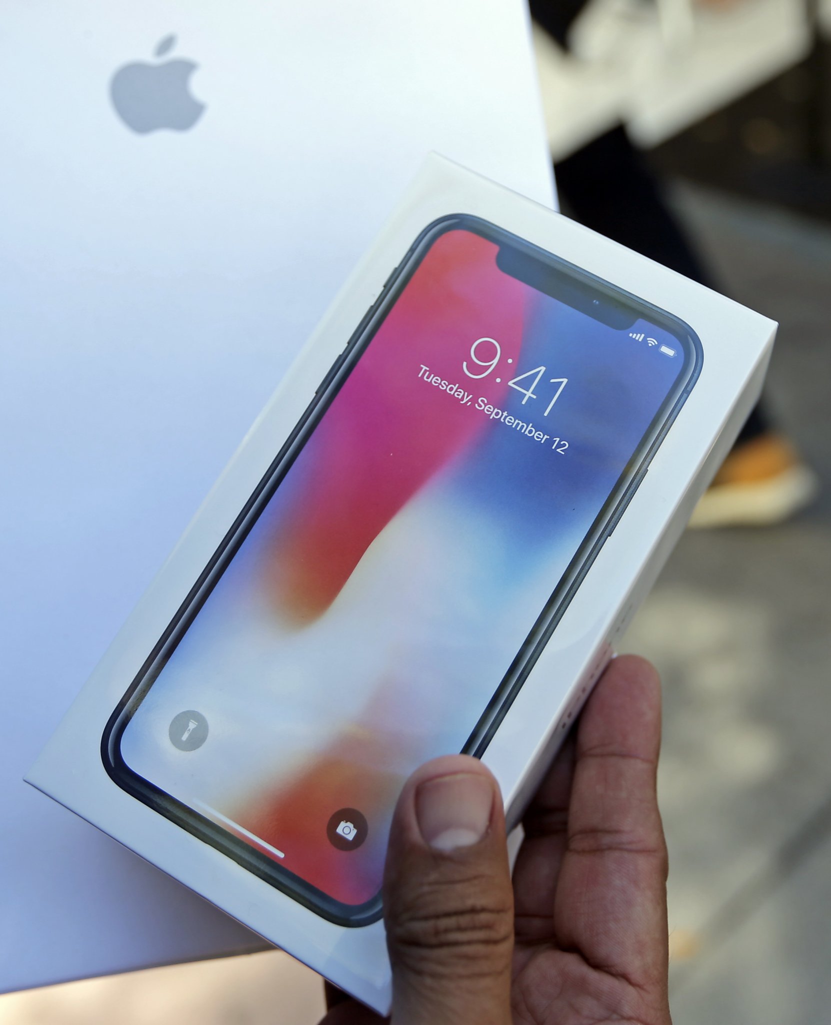 Beg, buy or steal: The mad scramble for Apple’s iPhone X