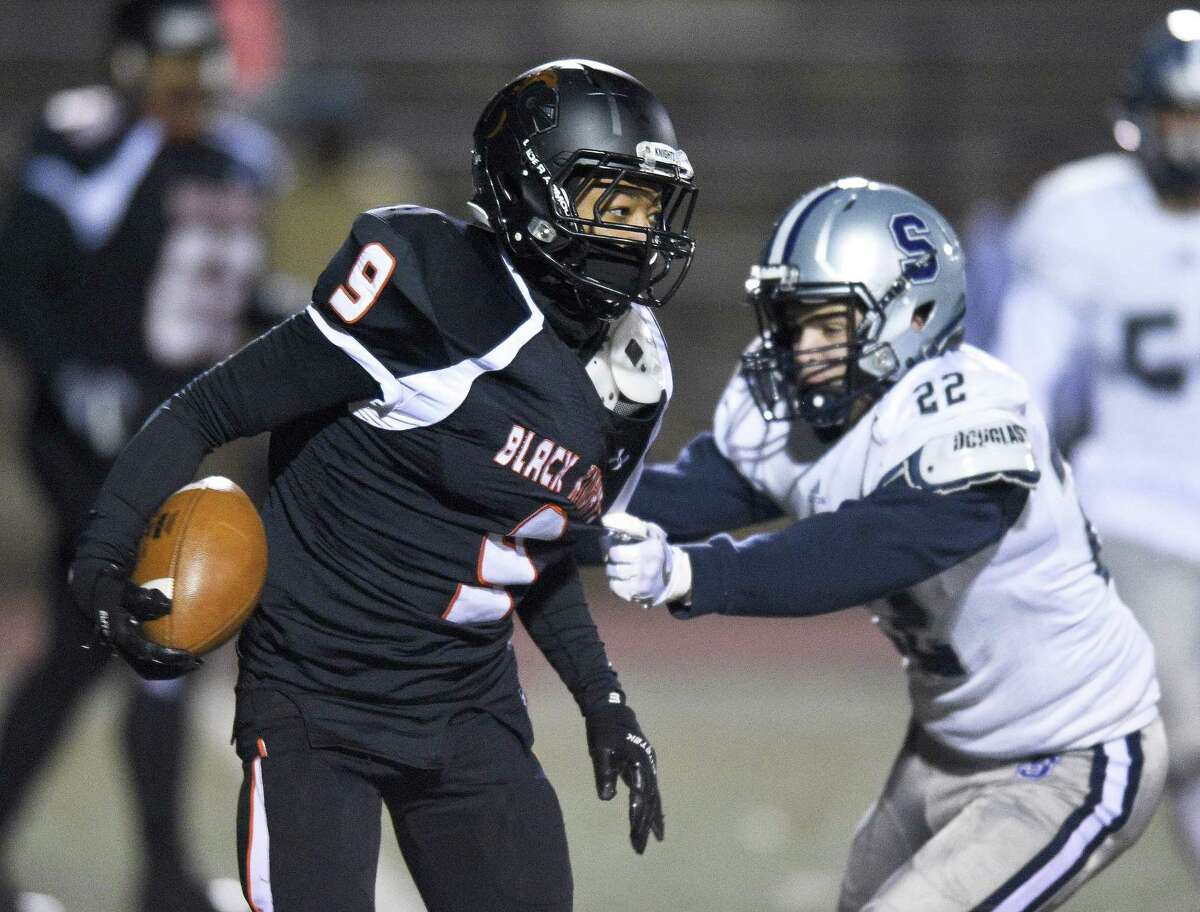 Staples football rolls over Stamford