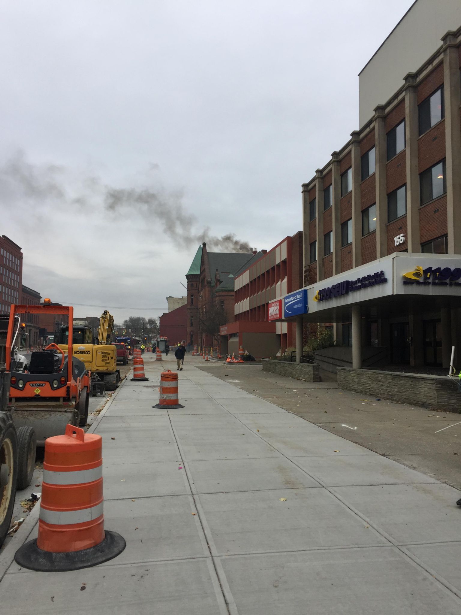 Soot, not smoke rises from roof of Albany Armory arena