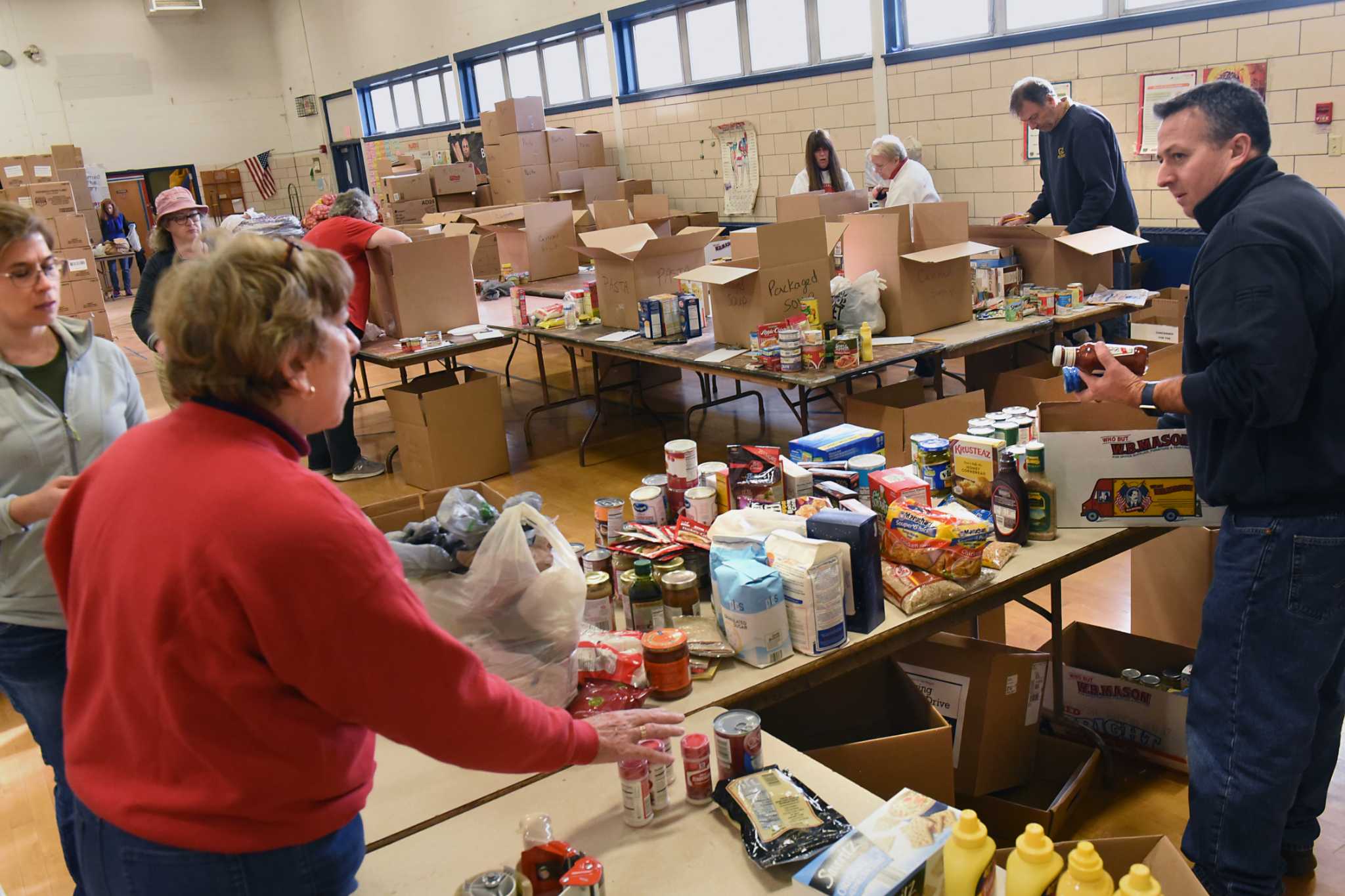 Volunteers make Concerned for the Hungry food drive succeed