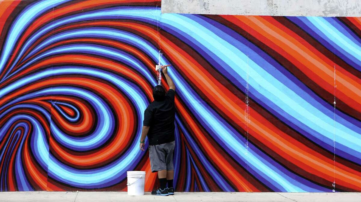 Muralists keeping colorful tradition alive