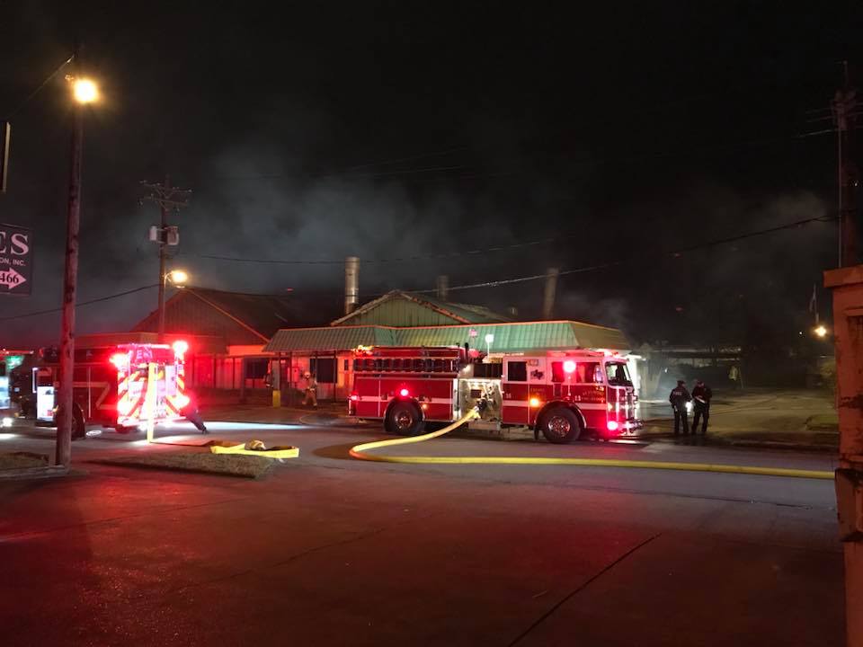 Auto shop fire trapped firefighters, likely arson