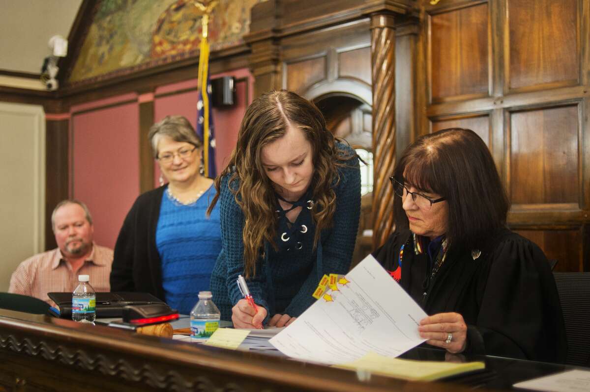 Three children find forever families on Adoption Day