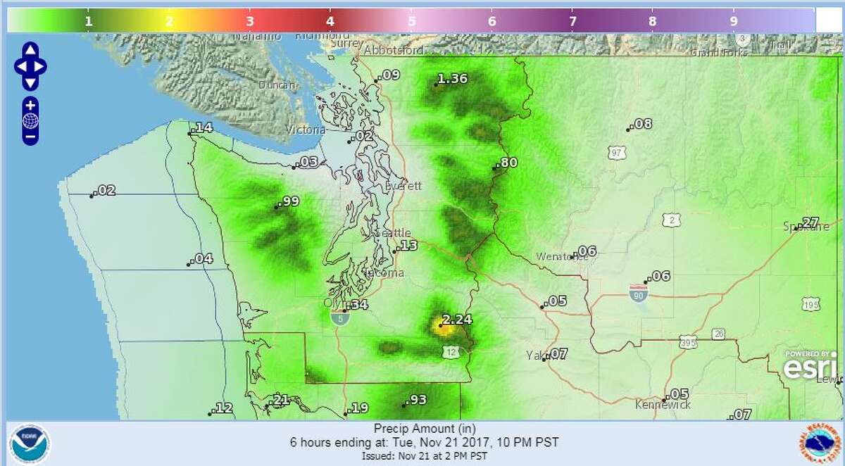 Flooding still expected as warm rains douse Seattle area