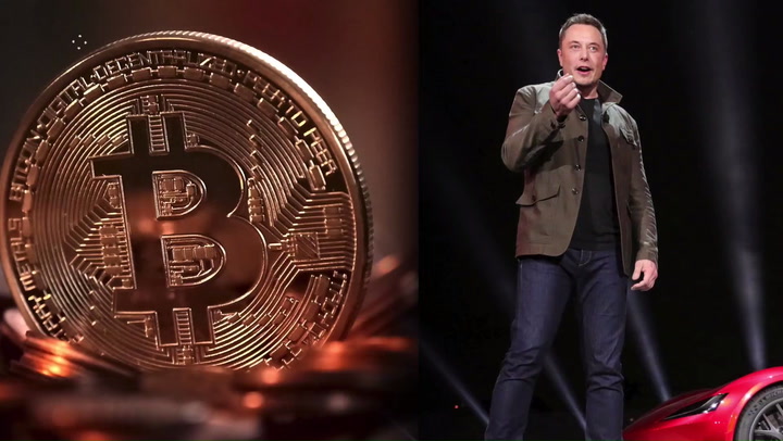 Elon Musk says he's not bitcoin inventor, warns of robot apocalypse