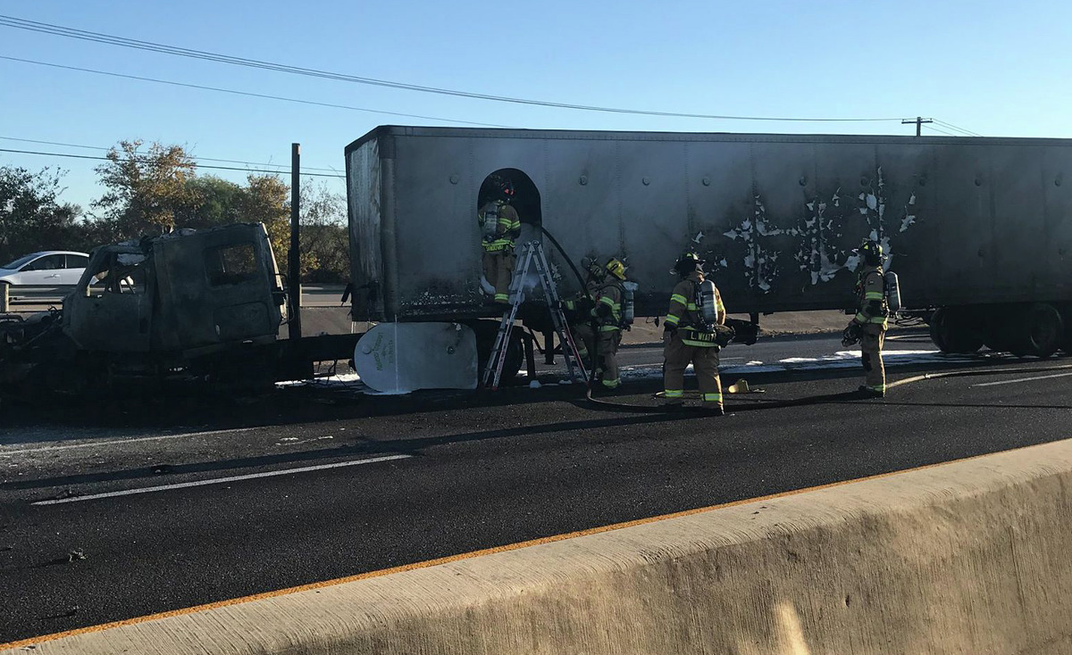 Photos show burnt 18-wheeler that shut down I-35 during Tuesday rush hour