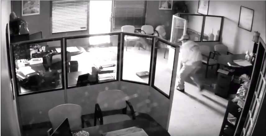 Video shows robber, break-in at Orange business