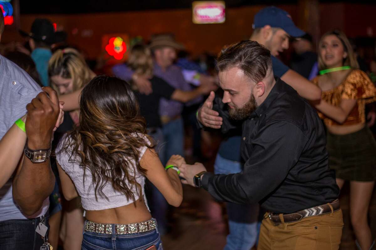 Photos: Daisy Dukes contest, two-stepping heat up San Antonio's Wild West