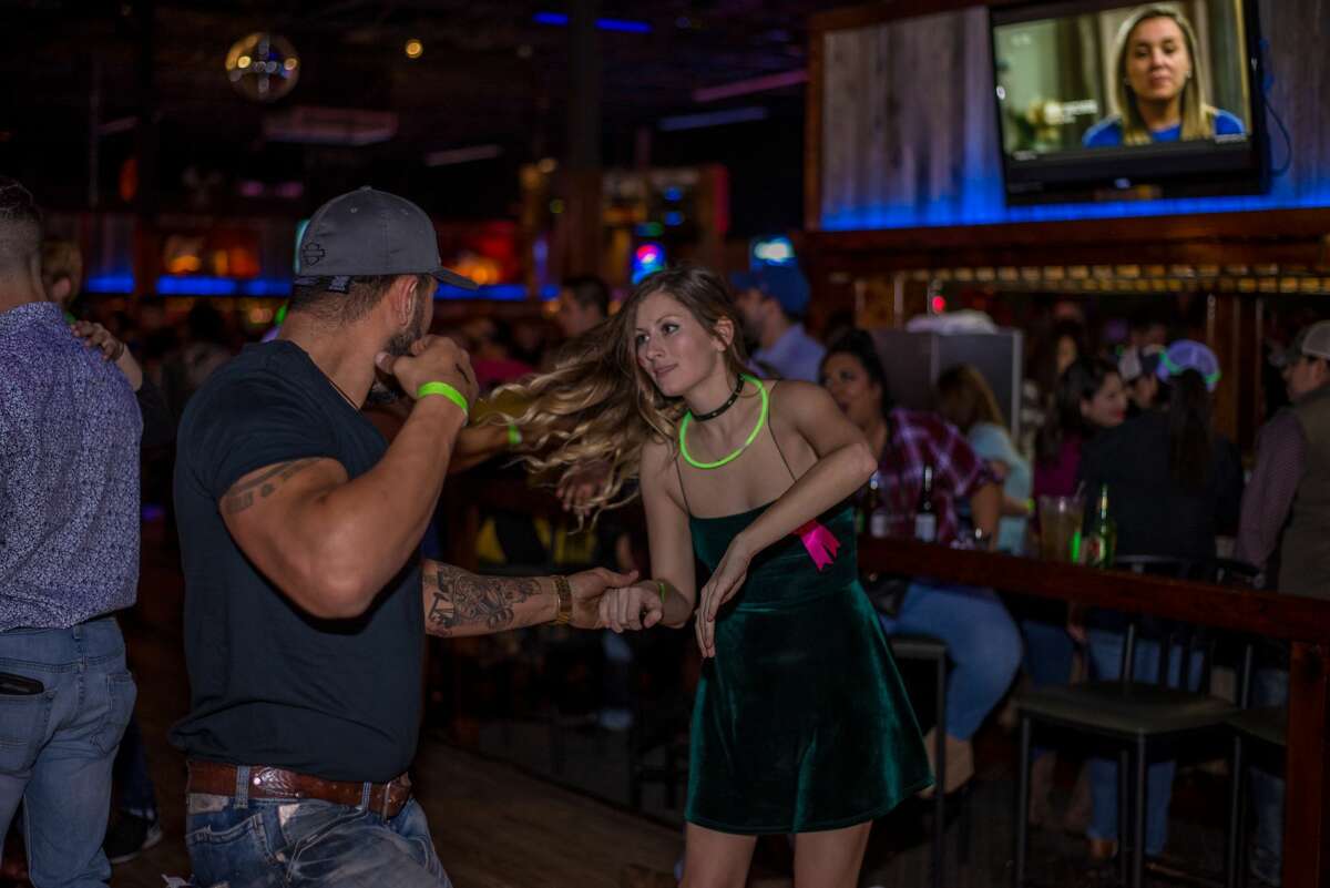 Photos: Daisy Dukes contest, two-stepping heat up San Antonio's Wild West