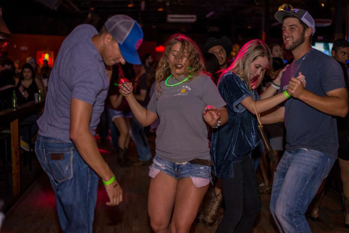 Photos: Daisy Dukes contest, two-stepping heat up San Antonio's Wild West