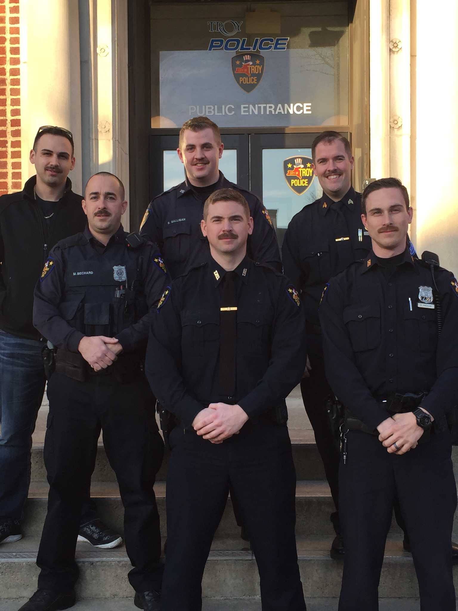 Photos: Troy officers help foundation with mustaches