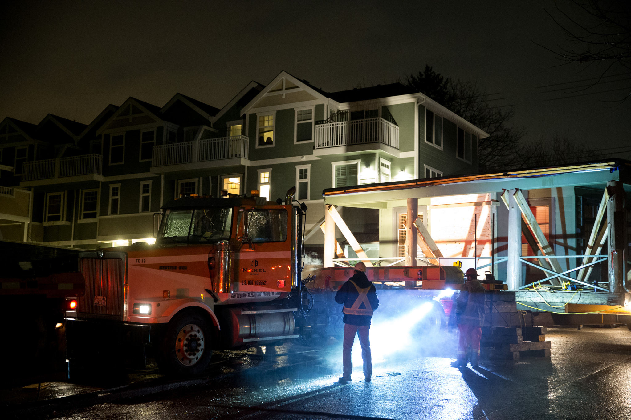 West Seattle 'log home' moves up the street