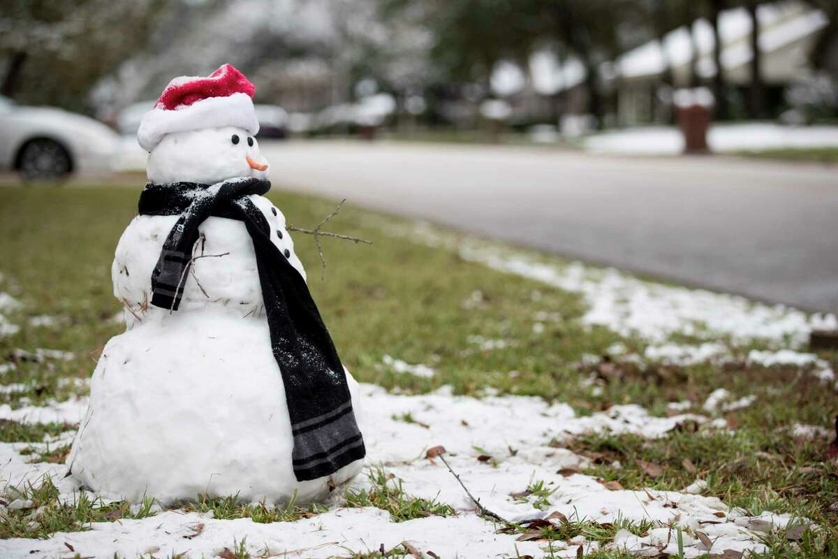 Houston wakes up to a beautiful snowfall, icy roads