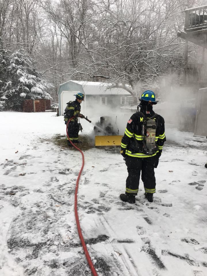 Tractor destroyed in driveway fire