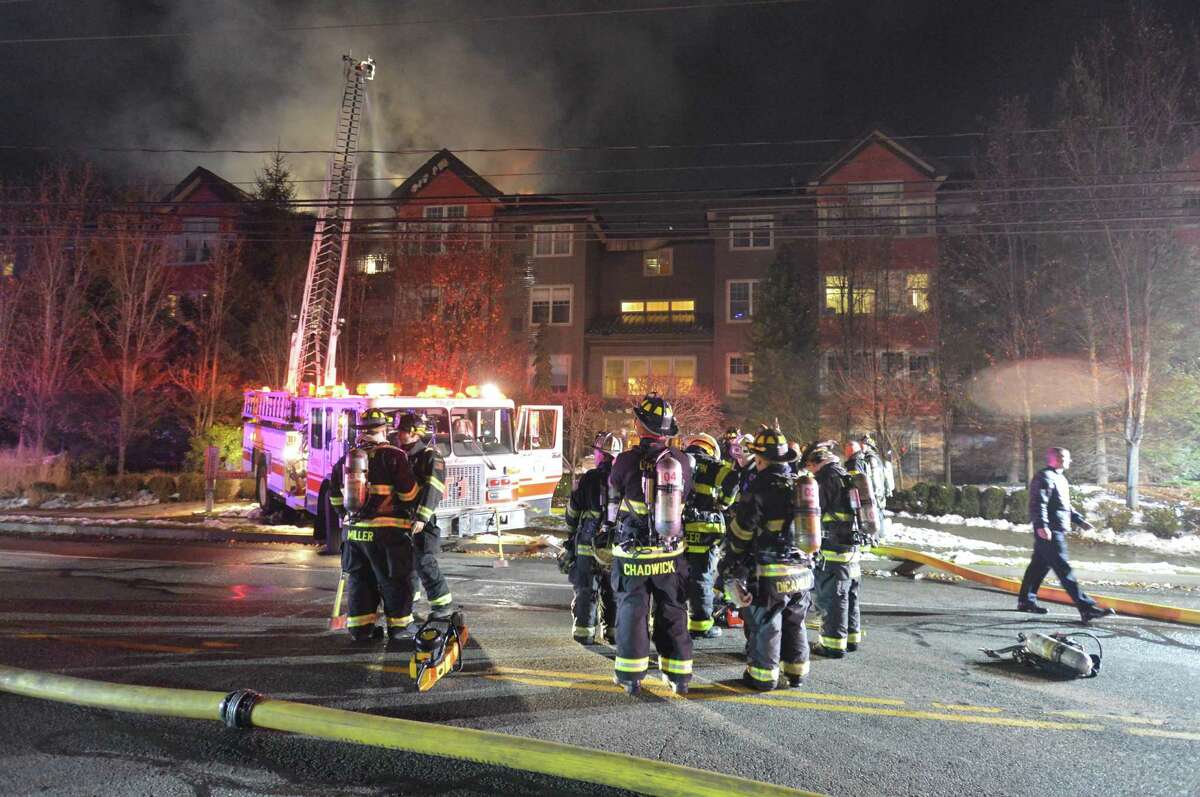 Flames tear through four-story Norwalk condo complex