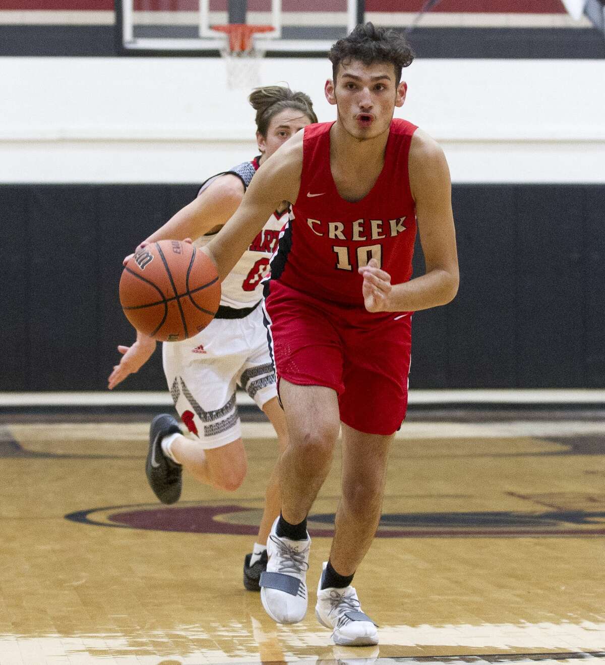 BOYS HOOPS: Burton's outburst lifts Porter past Caney Creek after halftime