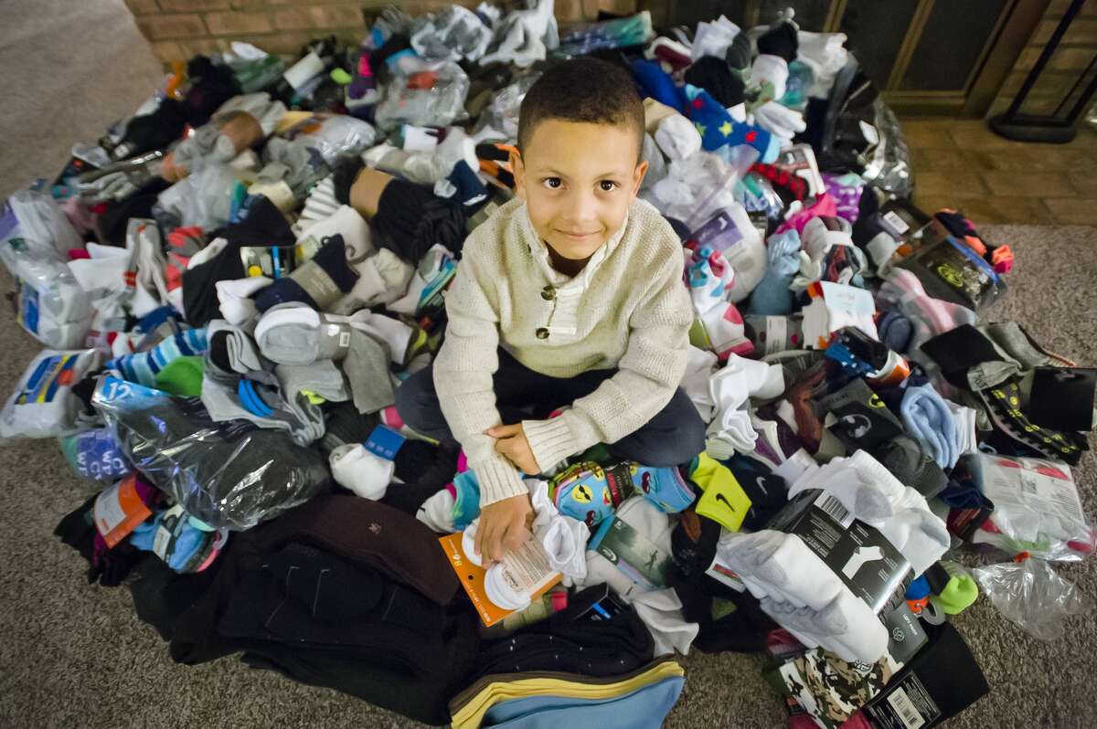 Midland's Jaxson Lewis, 6, collects 1,428 pairs of socks to donate to ...