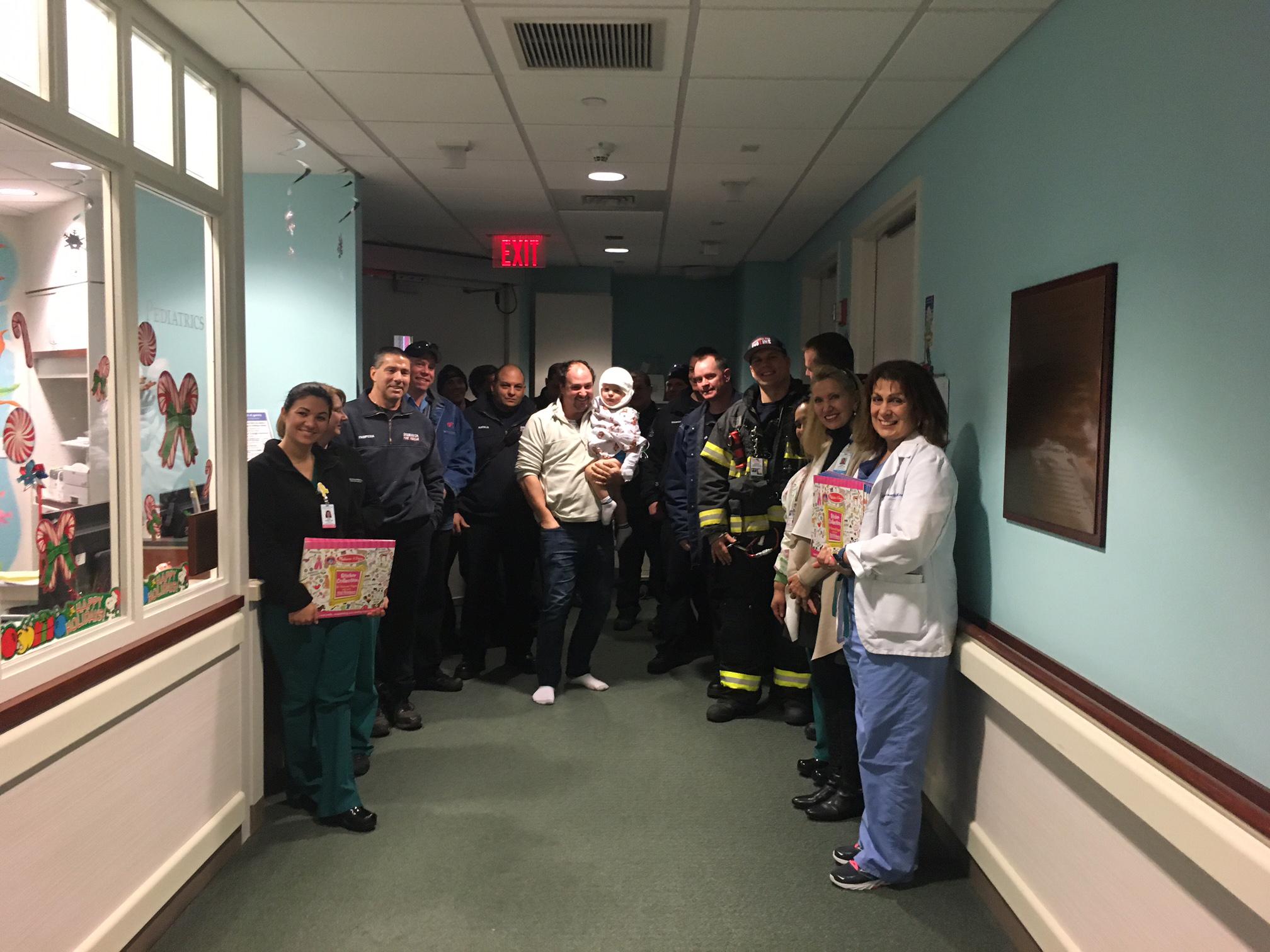 Firefighters bring holiday cheer to Greenwich Hospital