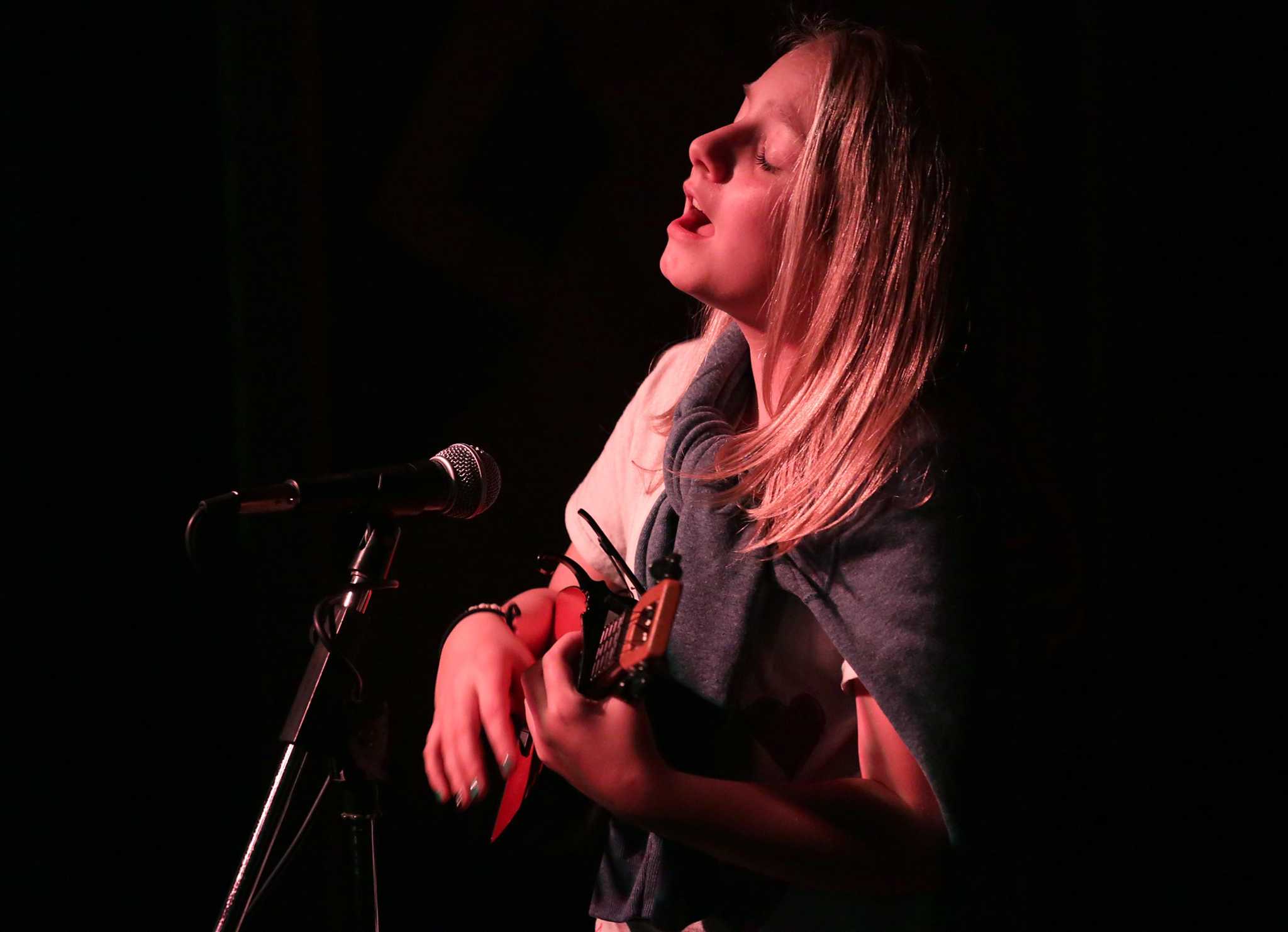 Young ukulele player wowing crowds with her own songs