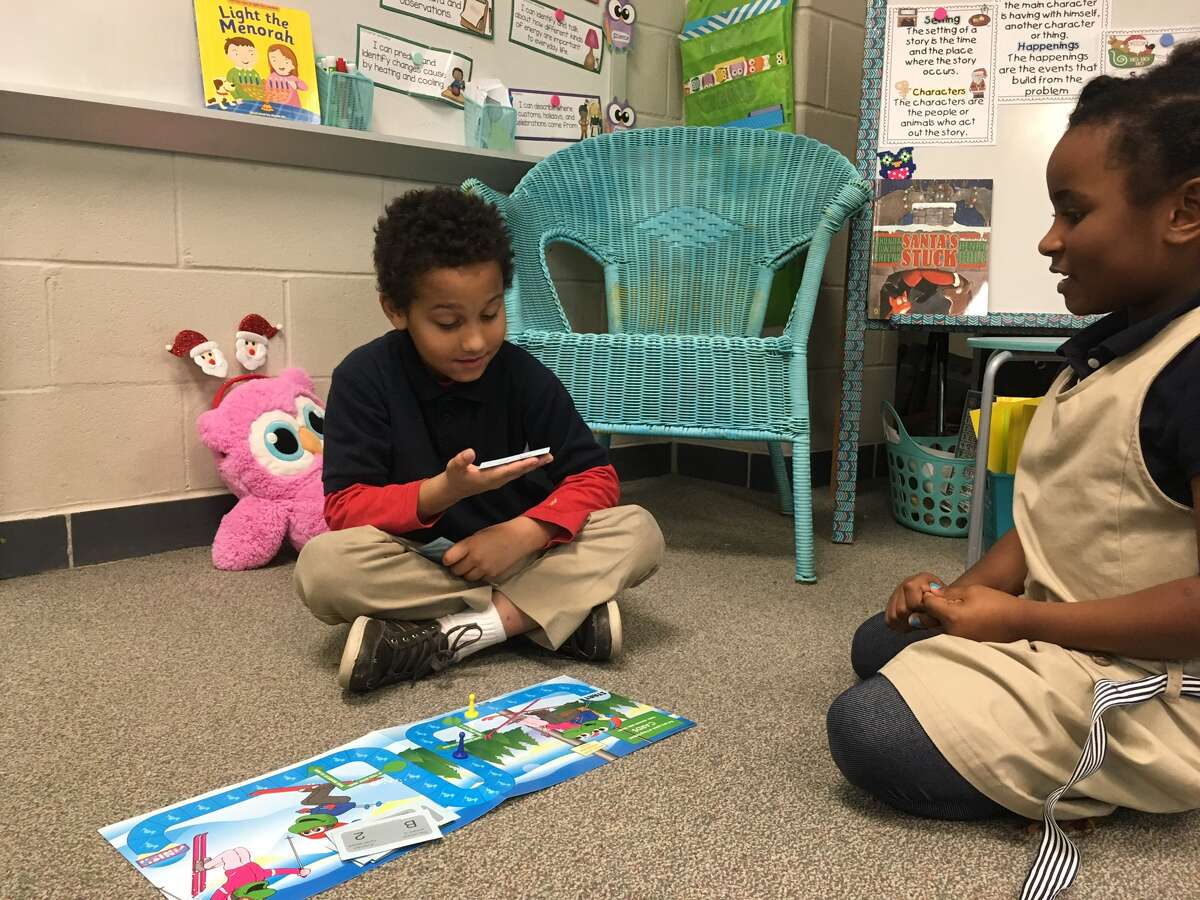 First-graders play to learn