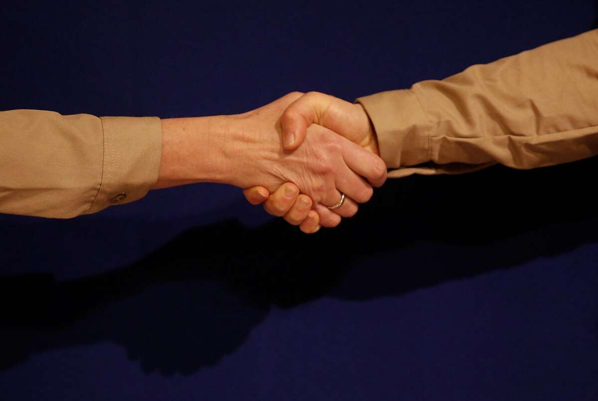 Simple handshake becomes work of art at City Hall