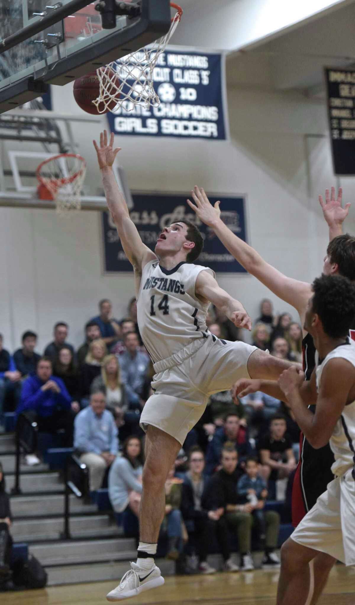 Boys Basketball: Immaculate edges Pomperaug