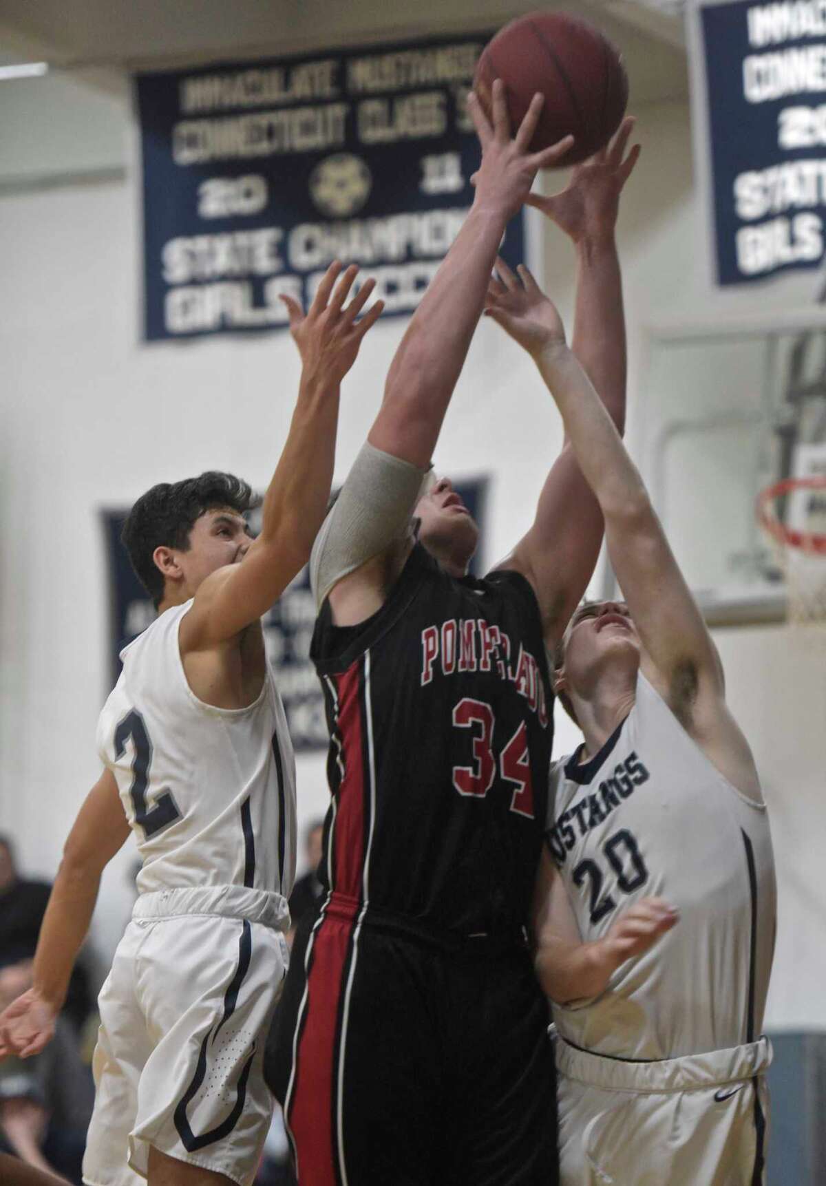 Boys Basketball: Immaculate edges Pomperaug