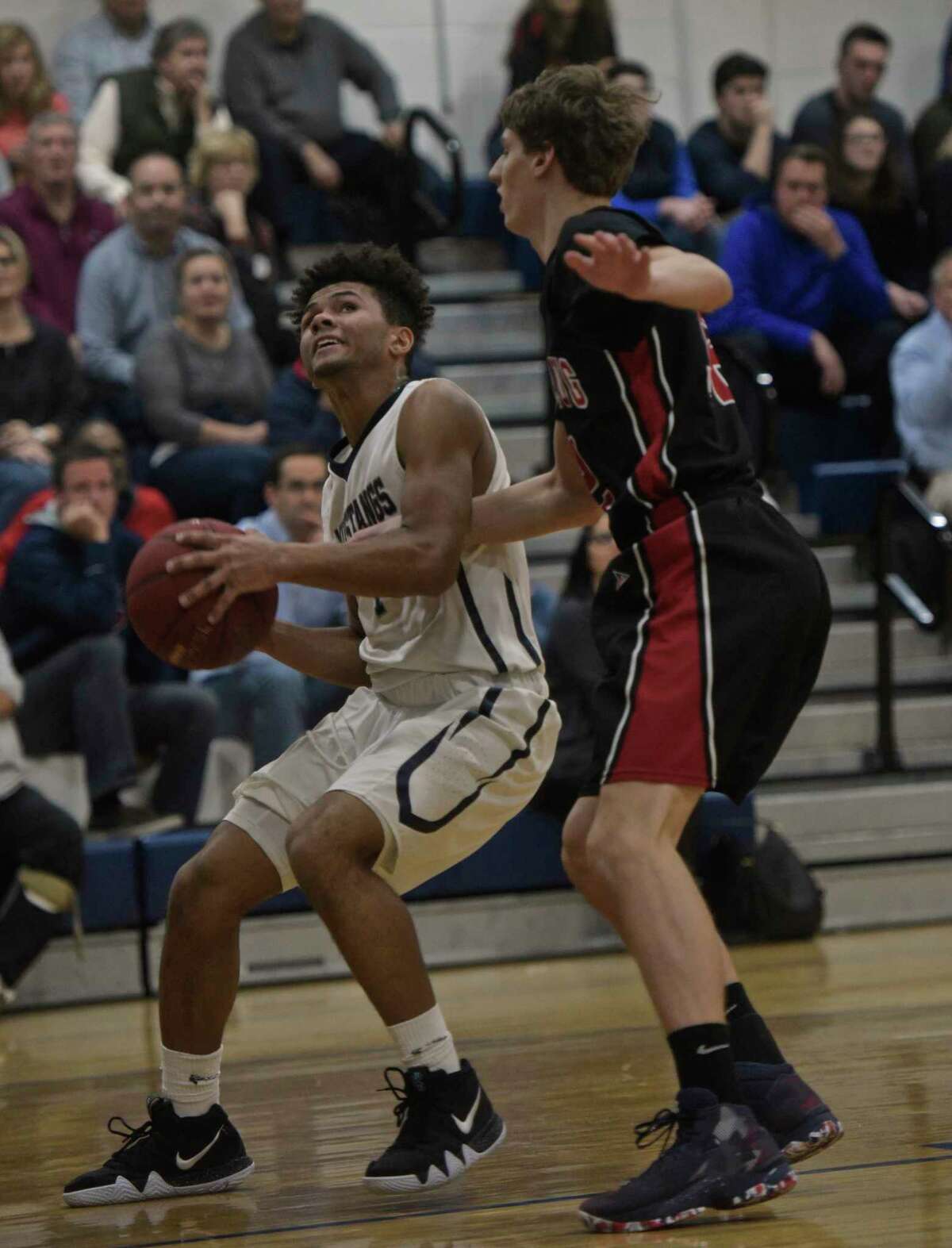 Boys Basketball: Immaculate edges Pomperaug