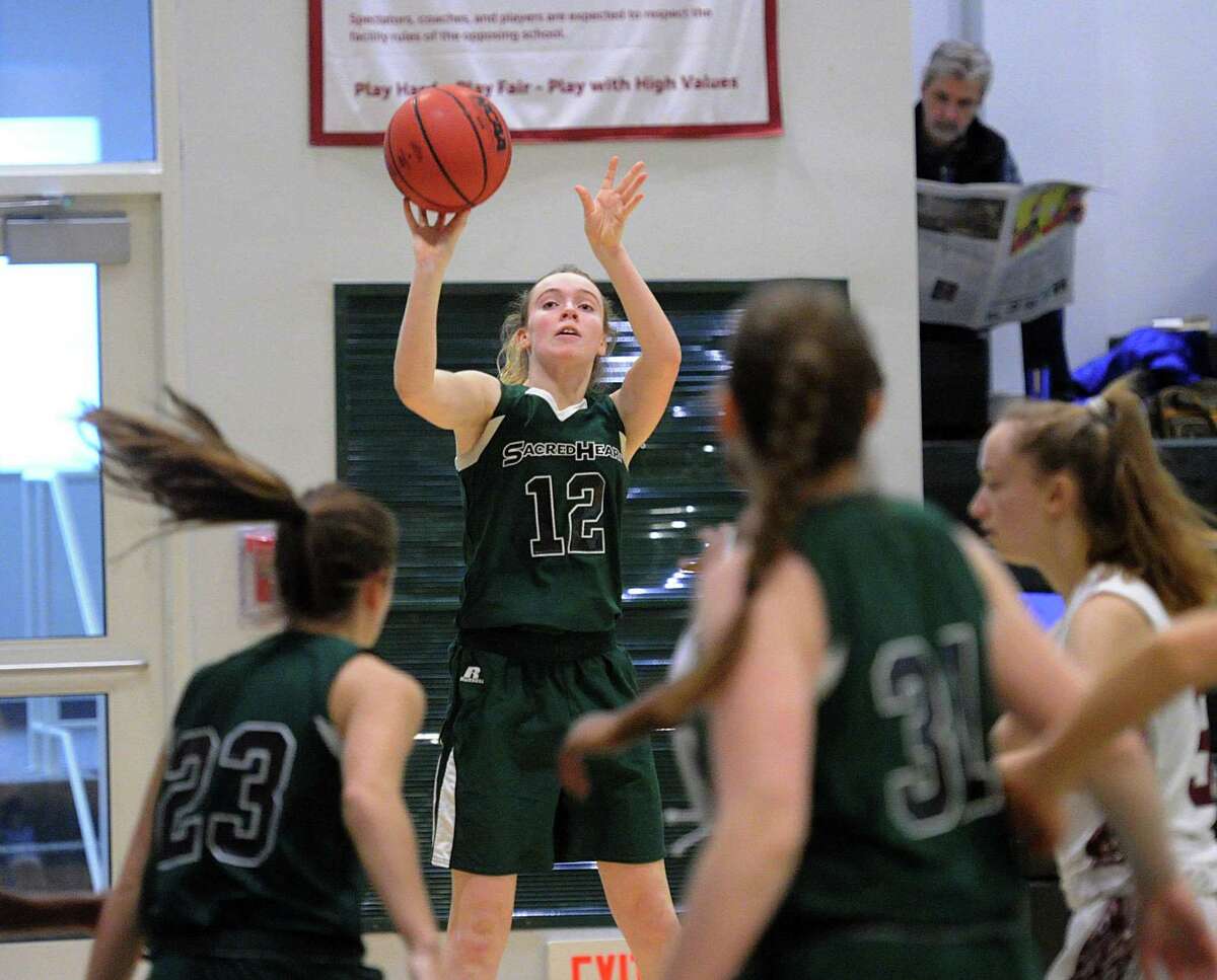 Sacred Heart basketball team edged by Hopkins in final seconds