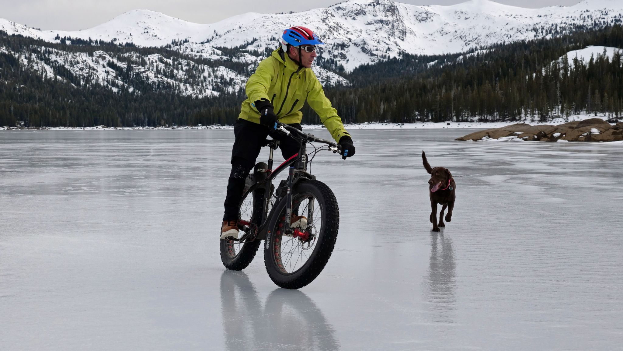 Video of a guy riding a bike across a frozen Caples Lake is surreal