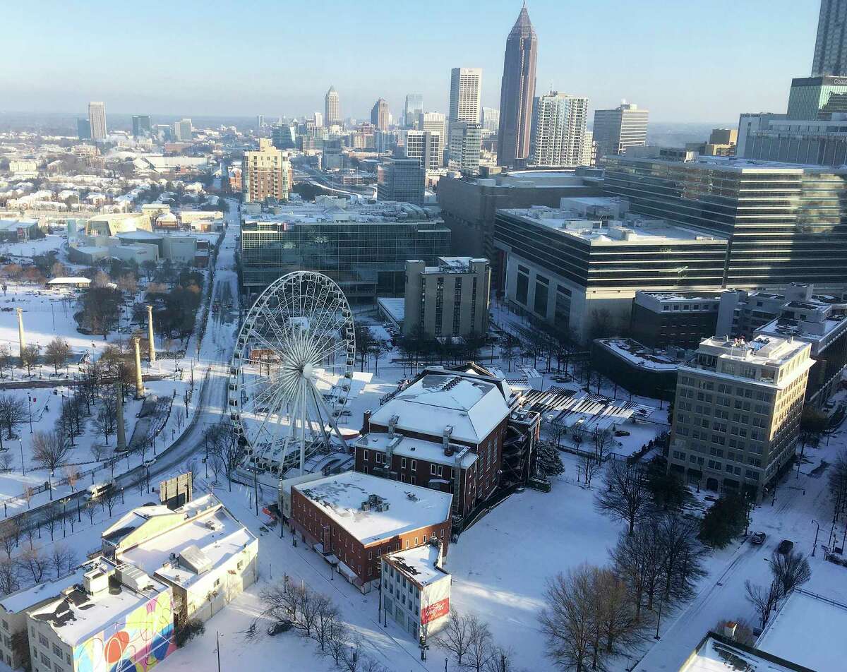 Snow, ice and record cold grip the South; at least 10 dead