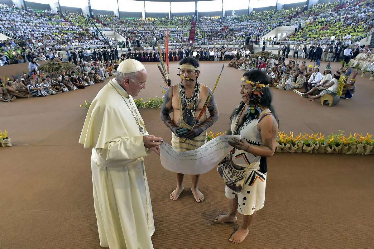 Peru’s indigenous welcome Pope Francis to scorching Amazon