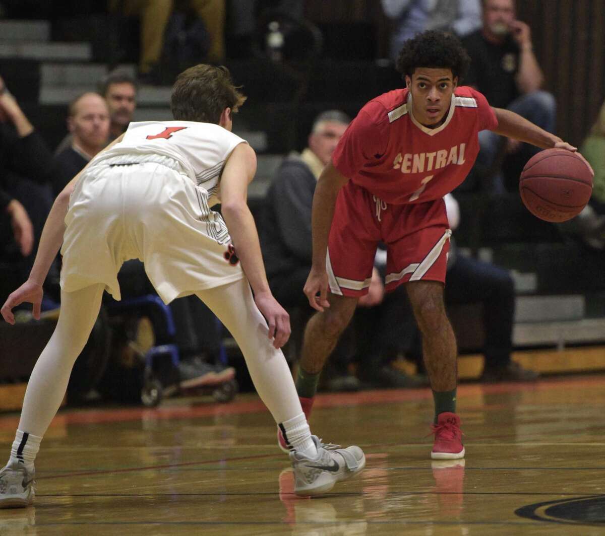 Boys basketball: Ridgefield pulls away from Central late