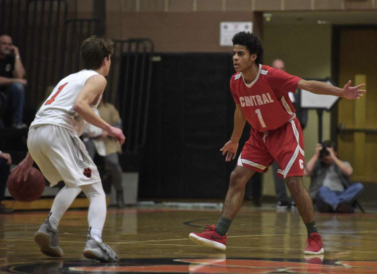 Boys basketball: Ridgefield pulls away from Central late