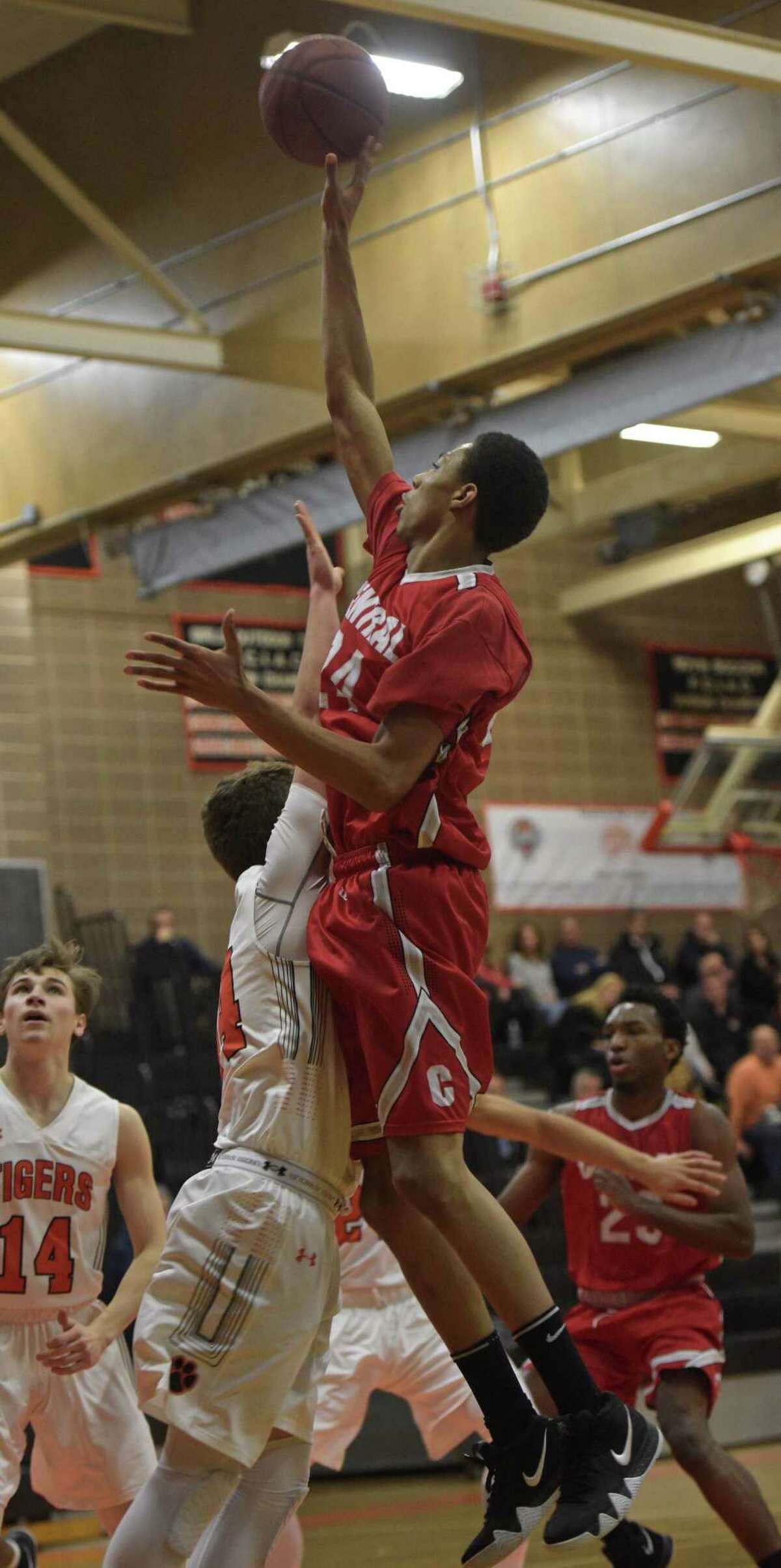 Boys basketball: Ridgefield pulls away from Central late