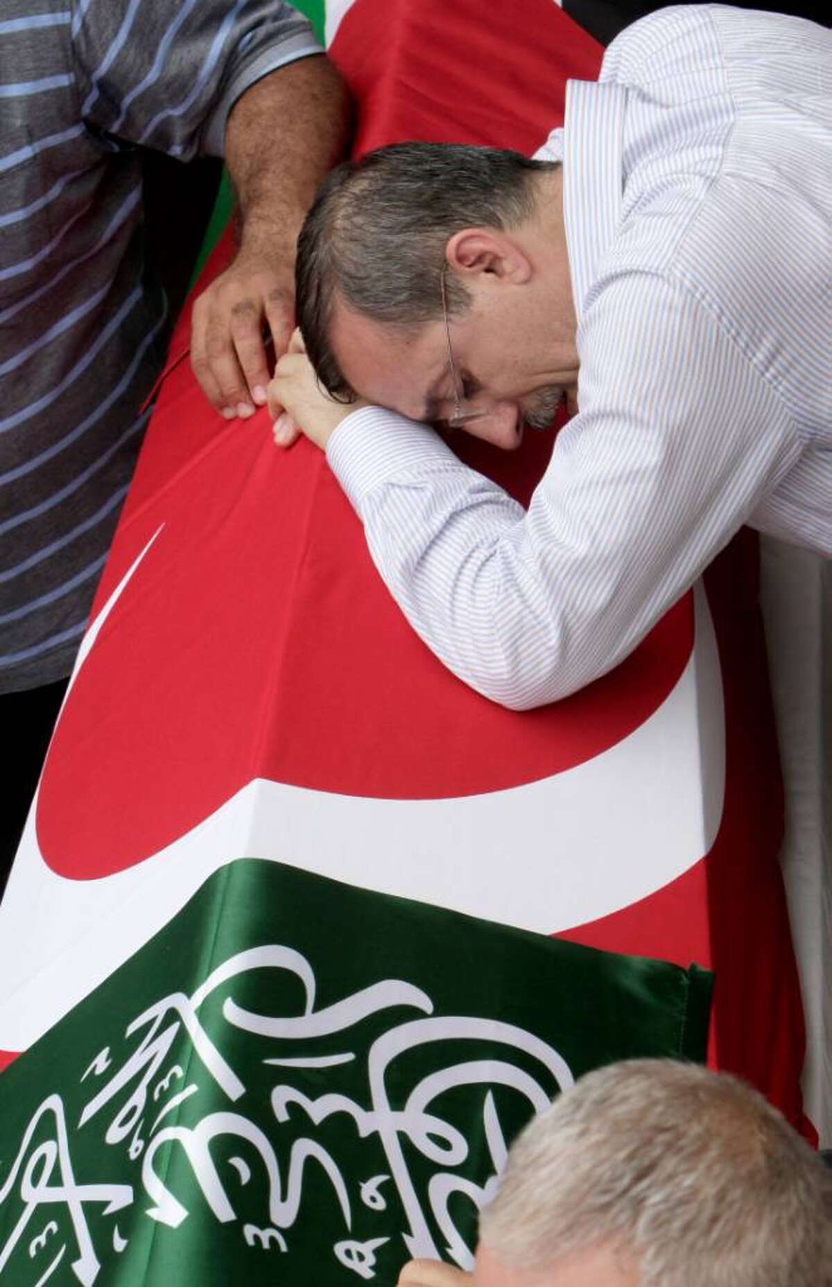 Troy native among activists slain in Israeli military raid