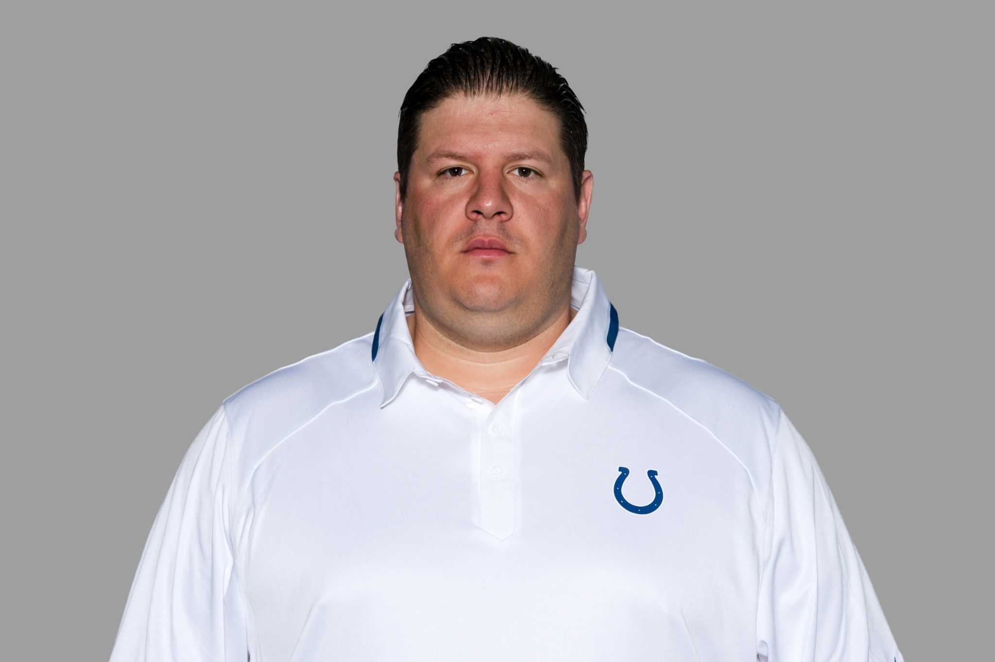 UConn football hires Colts assistant as offensive line coach