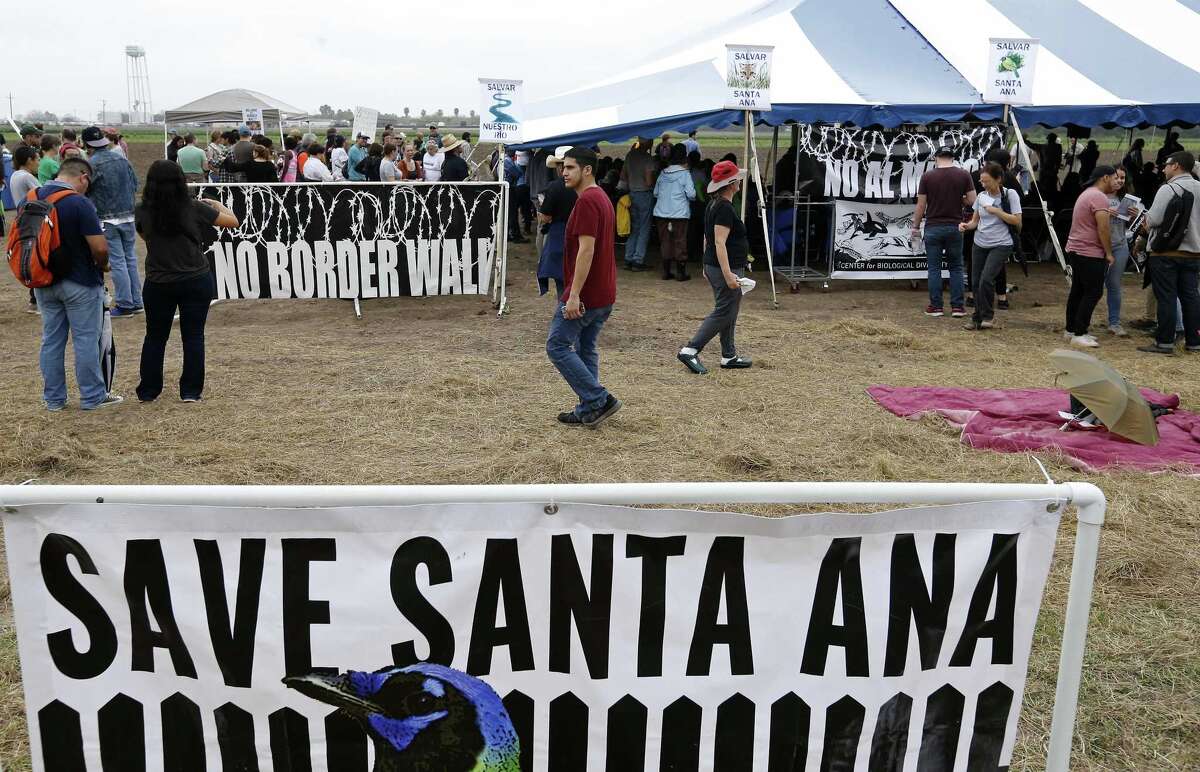 Hundreds turn out for rally opposing border wall through popular ...