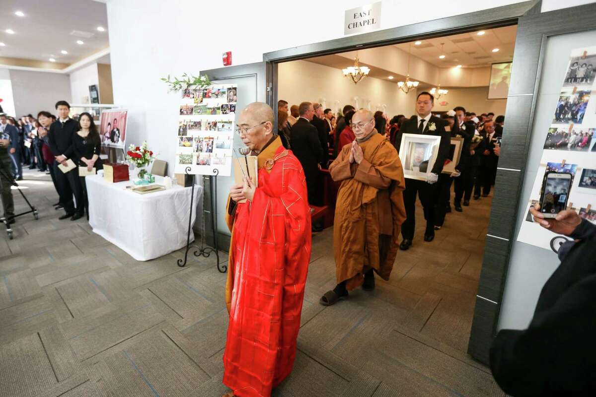 Family, friends crowd into funeral to remember slain Spring couple