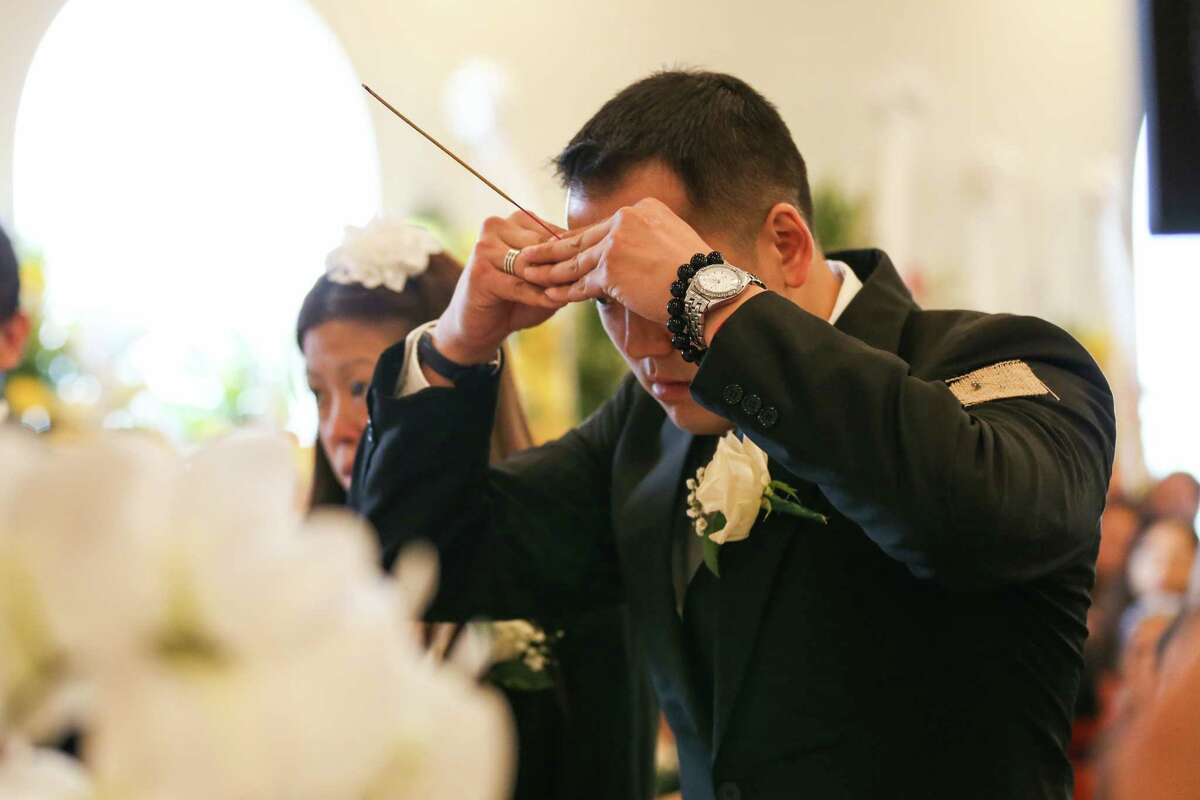 Family, friends crowd into funeral to remember slain Spring couple