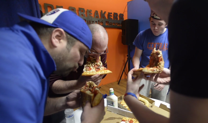 VIDEO: Pizza eating contest at Code Breakers Escape & Puzzle Rooms
