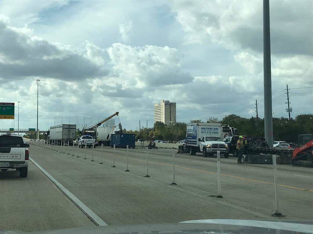 Katy Freeway still backed up after fatal wreck, hazmat spill