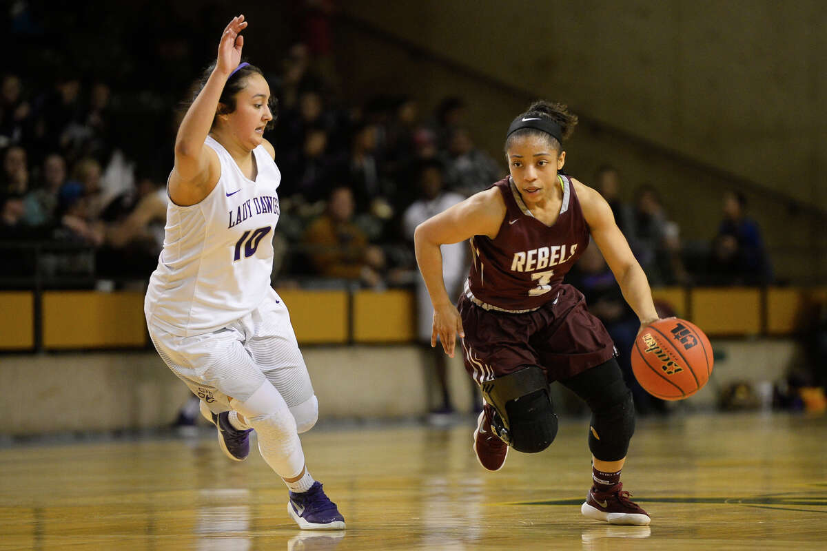 HS GIRLS BASKETBALL: Defense propels Lady Rebels to victory over MHS