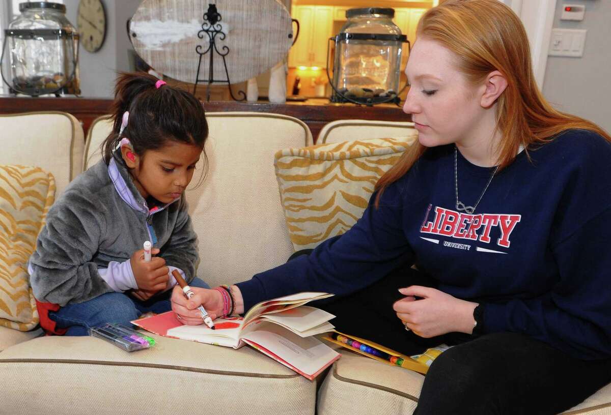 Trumbull girl works on language with new implant